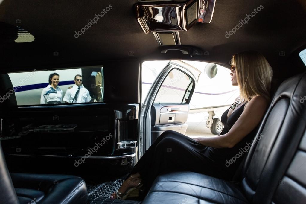 Elegant Woman In Limousine At Airport Terminal — Stock Photo ...