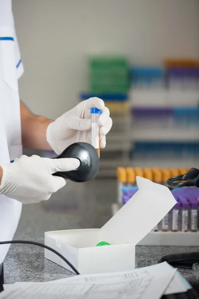 Technician Holding Blood Sample In Lab Stock Photo by ©SimpleFoto 56233647