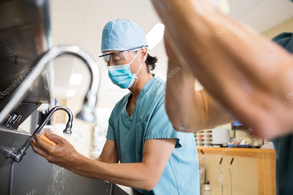 Surgical Scrubbing Hands and Arms — Stock Photo © SimpleFoto #41037499