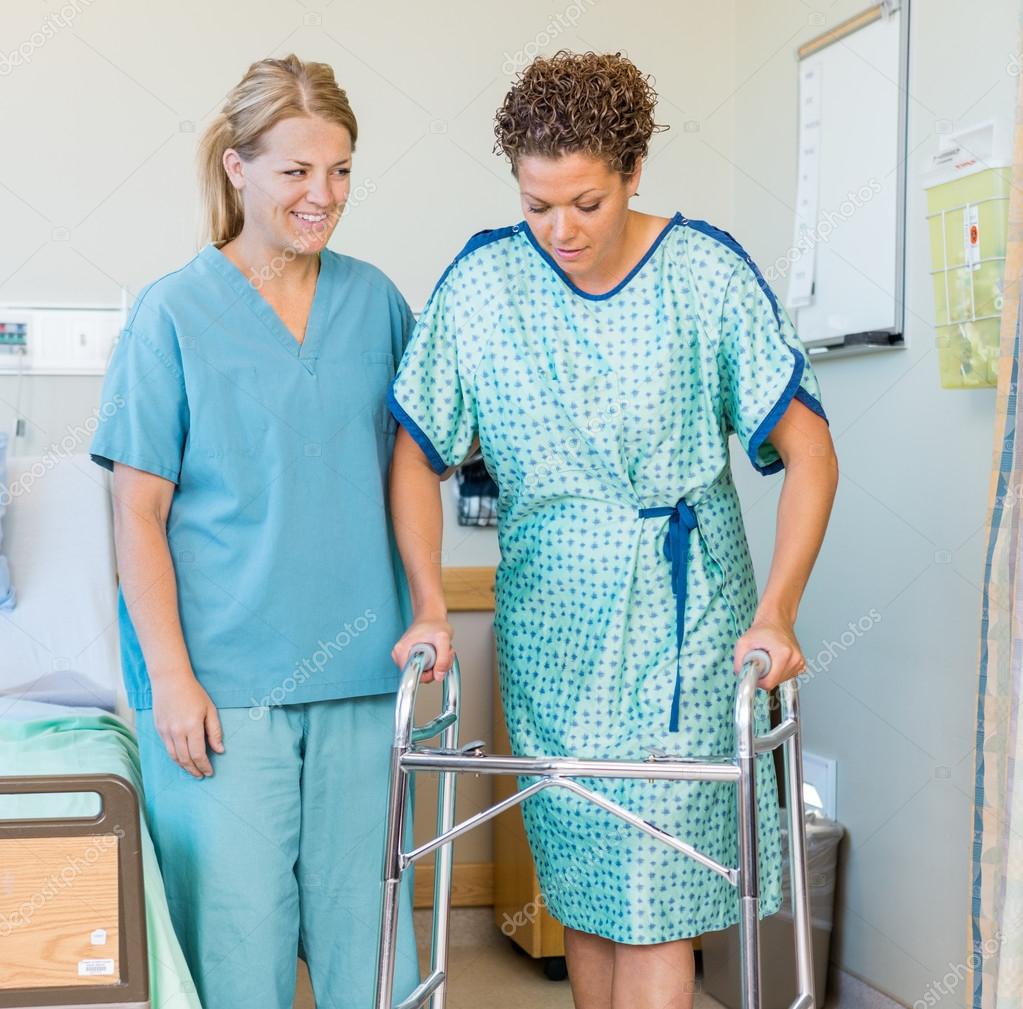 Patient Using Walker While Nurse Looking At Her — Stock Photo ...