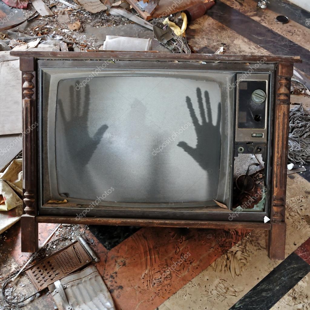 Ghost appears on flickering tv set — Stock Photo © sirylok #13749250
