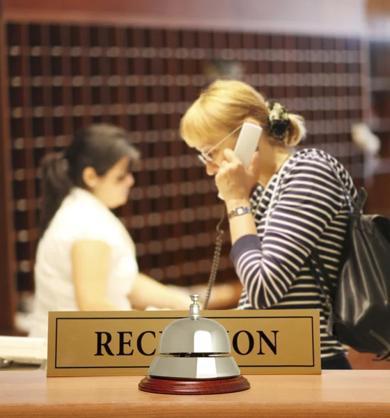 Hotel reception with bell — Stock Photo © kalinovsky #57494311
