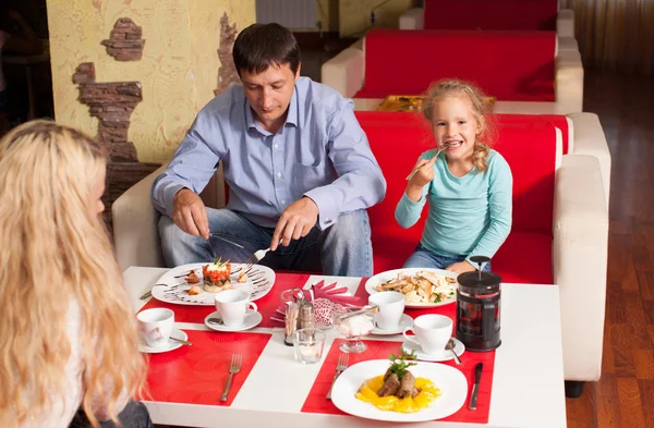 Family in cafe - Stock Image - Everypixel
