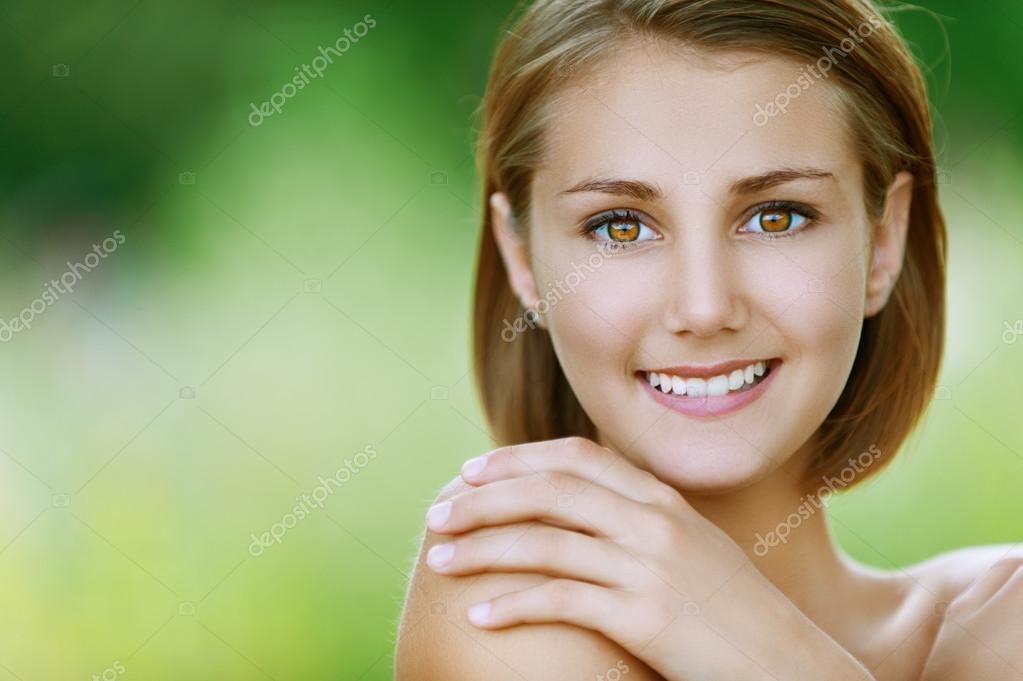 Smiling beautiful young woman close up — Stock Photo © BestPhotoStudio ...