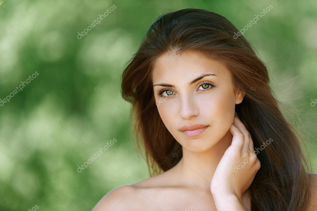 Beautiful dark-haired young woman — Stock Photo © BestPhotoStudio #13773416