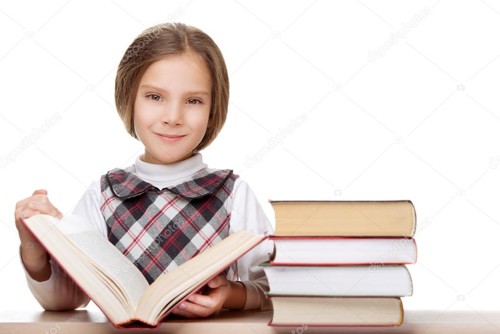 Little girl reading big book Stock Photo by ©BestPhotoStudio 21624347