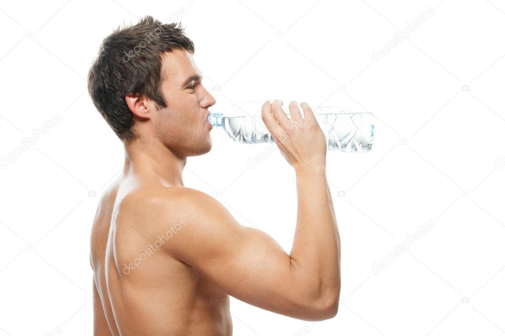 Portrait of young man drinking water Stock Photo by ©BestPhotoStudio ...