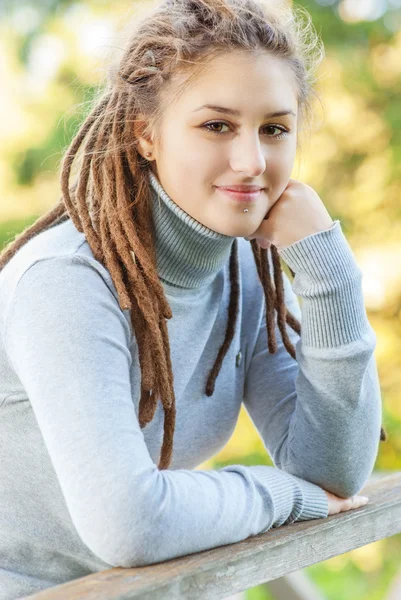 Beautiful girl with dreadlocks — Stock Photo © BestPhotoStudio #1610679