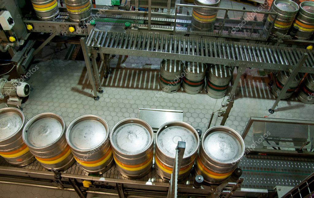 Beer kegs on the production line in the factory Stock Photo by ...