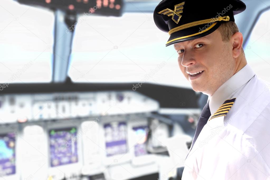 Pilot in cockpit Stock Photo by ©ambrozinio 26291551