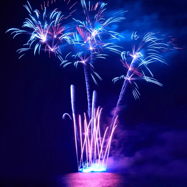 Colorful blue sparkling fireworks Stock Photos, Royalty Free Colorful ...