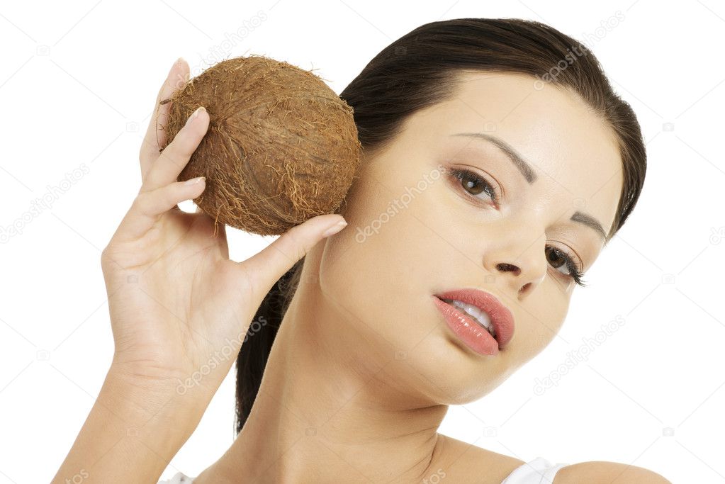 Beautiful woman with coconut in hands — Stock Photo © piotr_marcinski ...