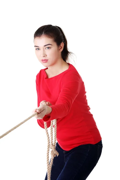 Woman pulling rope Stock Photos, Royalty Free Woman pulling rope Images ...