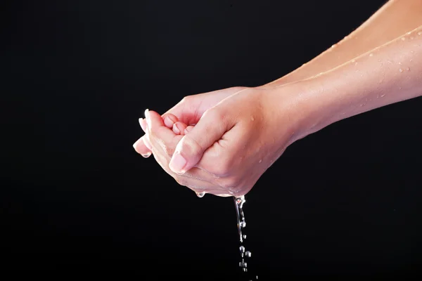 Water falling on female hands Stock Photo by ©piotr_marcinski 23455018