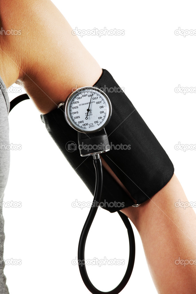 Female hand with blood-pressure meter — Stock Photo © piotr_marcinski ...