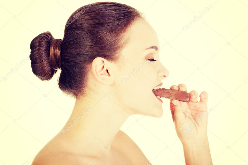 Beautiful woman biting a chocolate bar Stock Photo by ©piotr_marcinski ...