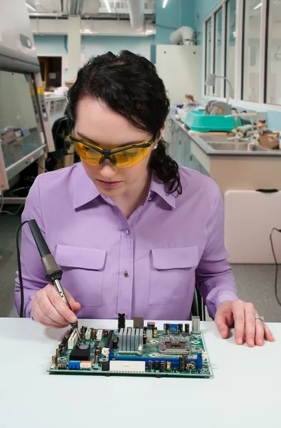 Woman soldering — Stock Photo © robeo123 #50614513