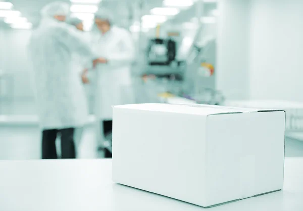 White box at automated production line at modern factory - ready for ...
