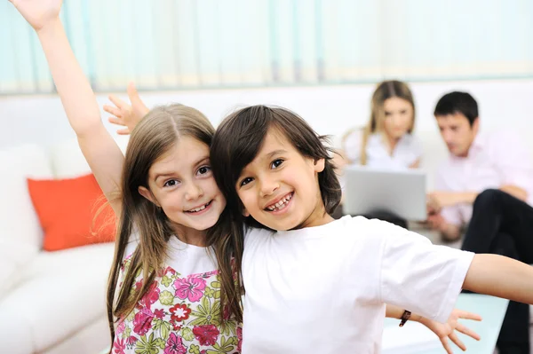 Happy child at home with family Stock Photo by ©zurijeta 21370227