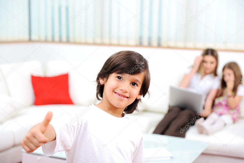 Happy child at home with family Stock Photo by ©zurijeta 21370227