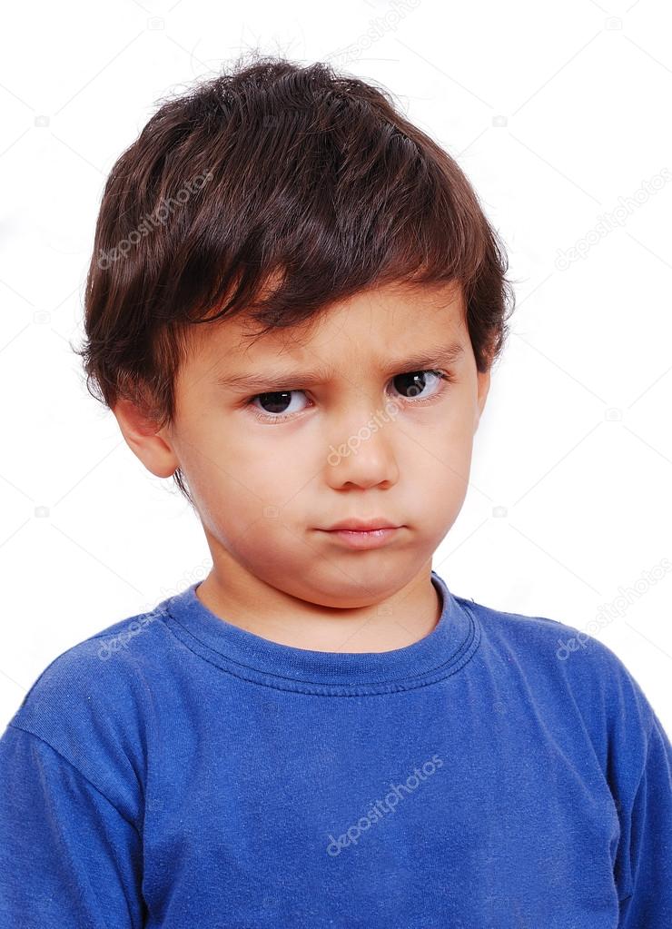 Cute kid with angry expression on his face — Stock Photo © zurijeta ...