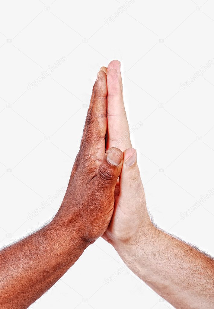 Two hands black and white on each other Stock Photo by ©zurijeta 21466089