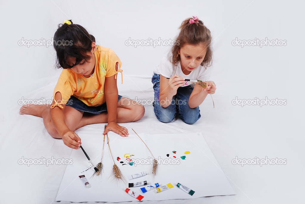 Beautiful scene of two girls and playing with colors on ground — Stock ...