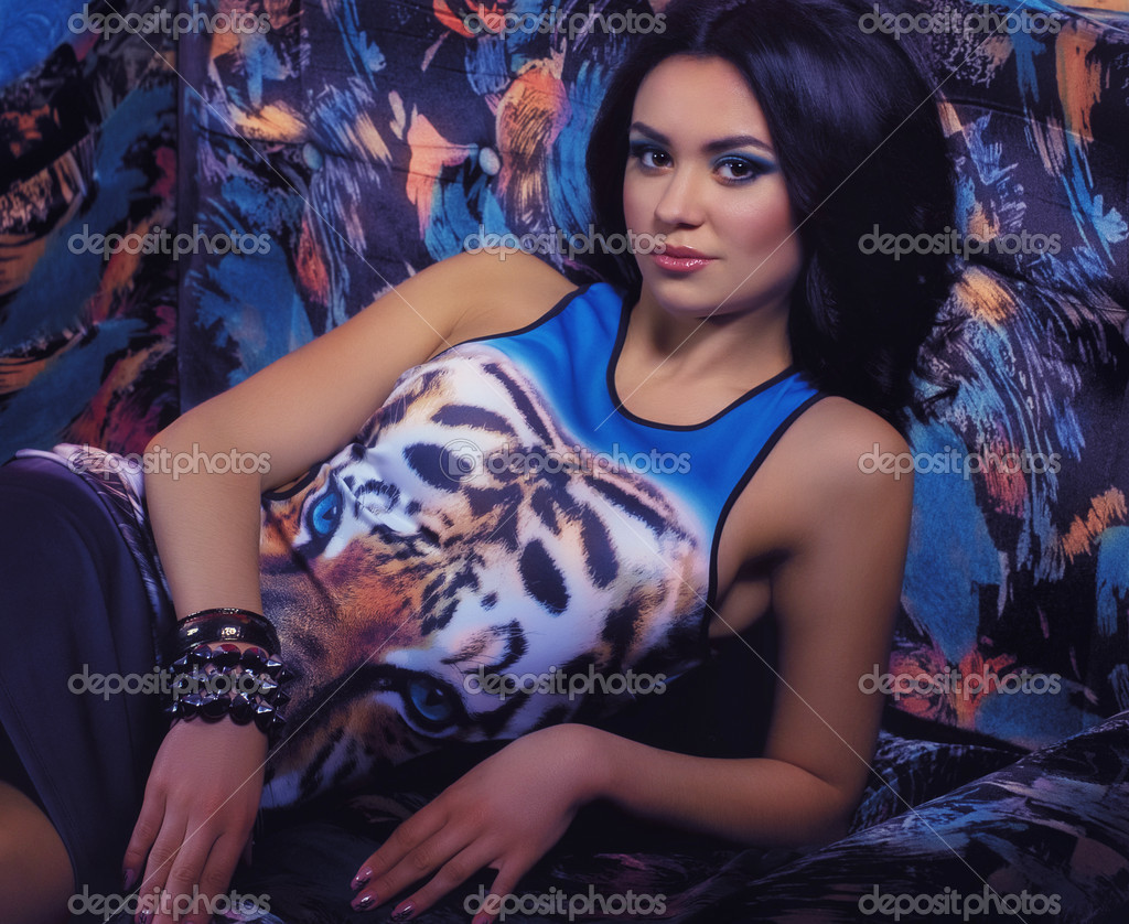 Young woman in tiger t-shirt Stock Photo by ©Forewer 44301077