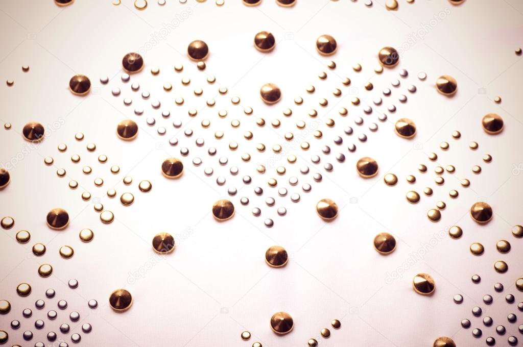 Gold rivets background Stock Photo by ©Forewer 49718303