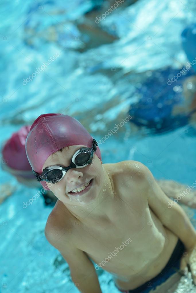 Happy child on swimming pool Stock Photo by ©.shock 14062195