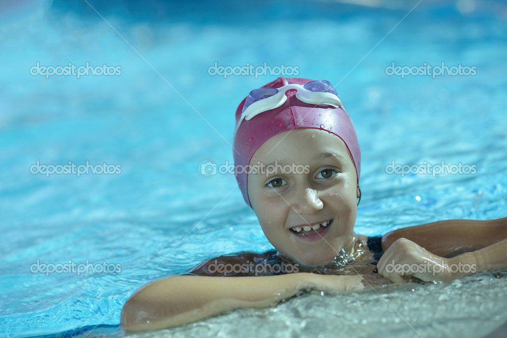 Happy child on swimming pool Stock Photo by ©.shock 14062451