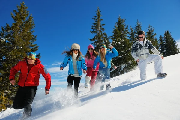 Friends have fun at winter on fresh snow - Stock Image - Everypixel