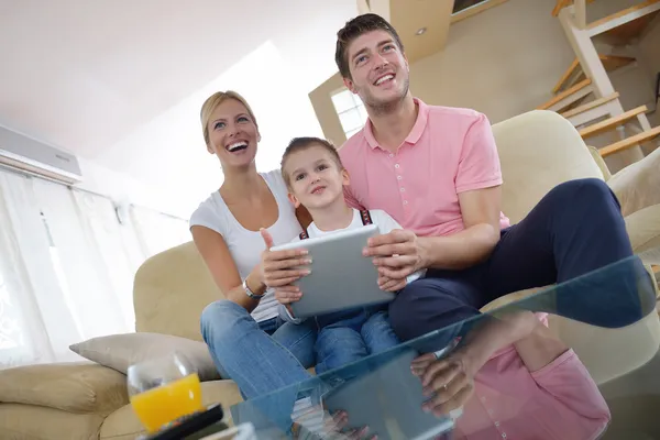 Family at home using tablet computer - Stock Image - Everypixel