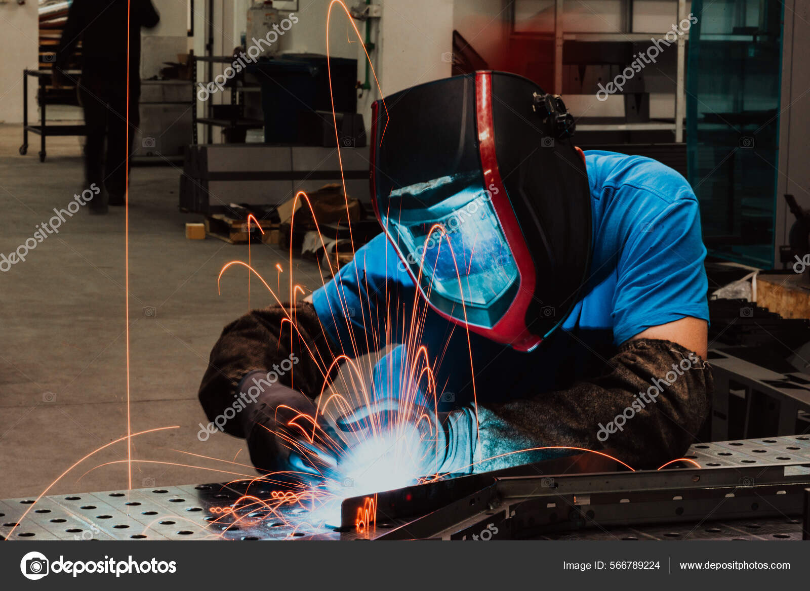 Professional Heavy Industry Welder Working Inside factory, Wears Helmet ...