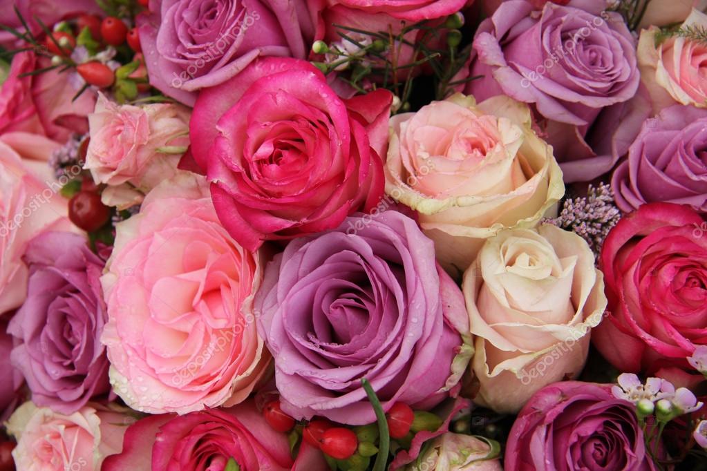 Purple and pink roses wedding arrangement Stock Photo by ©portosabbia ...