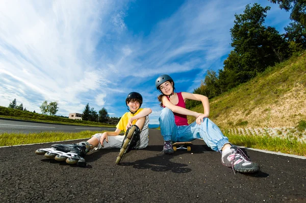 Active young people - rollerblading, skateboarding - Stock Image ...