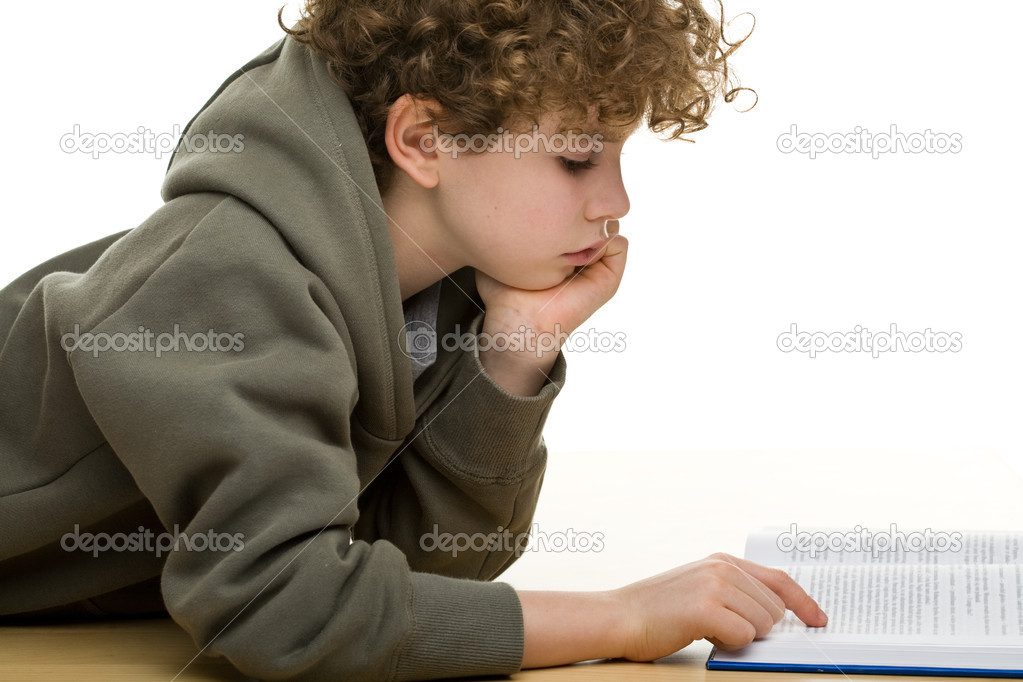 Boy reading a book Stock Photo by ©gbh007 32709949