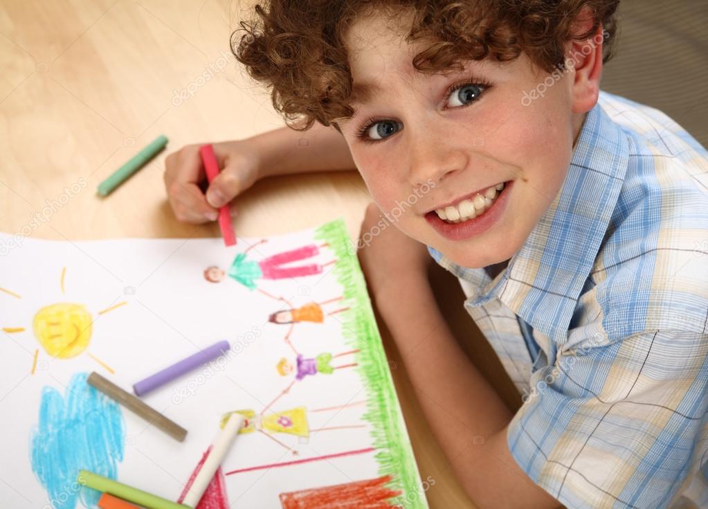 Boy drawing Stock Photo by ©gbh007 32718757