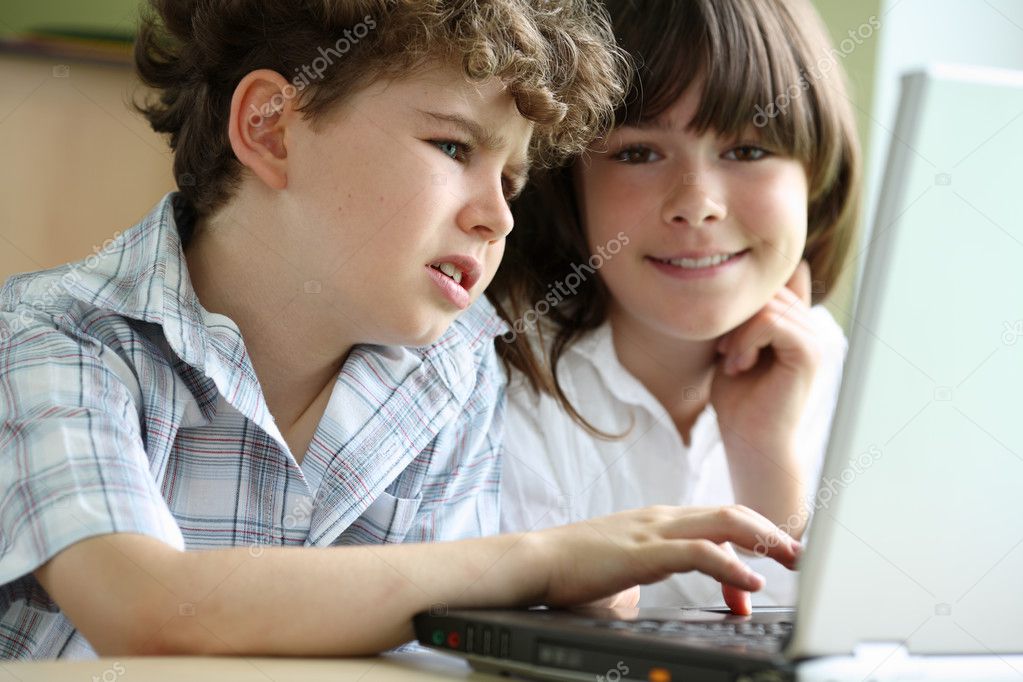 Kids using laptop Stock Photo by ©gbh007 32736491