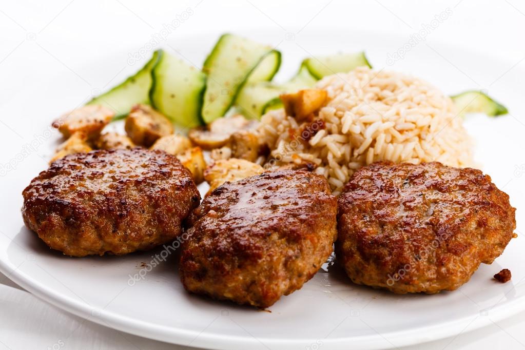 Fired meat, white rice and vegetables — Stock Photo © gbh007 #33197953