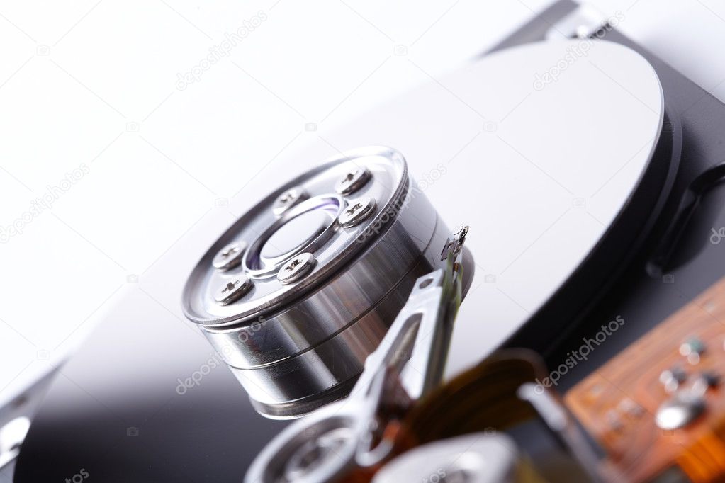 Opened hard disk drive Stock Photo by ©strelok 25481399