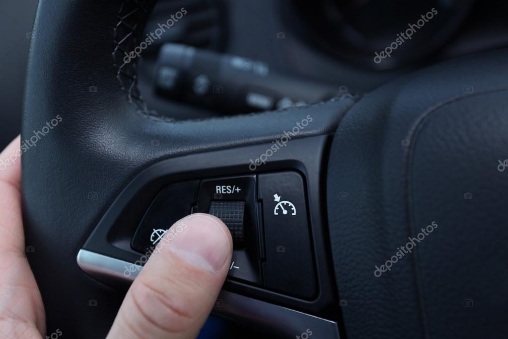 Speed limitation on a steering wheel in modern car Stock Photo by ...