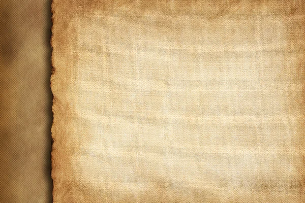 Paper sheet on canvas background — Stock Photo © digieye #13371359