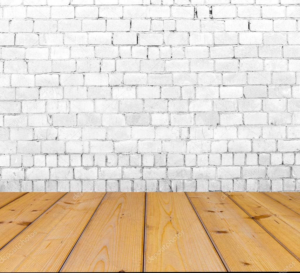 Old brick wall on wood floor — Stock Photo © REDPIXEL #31570983