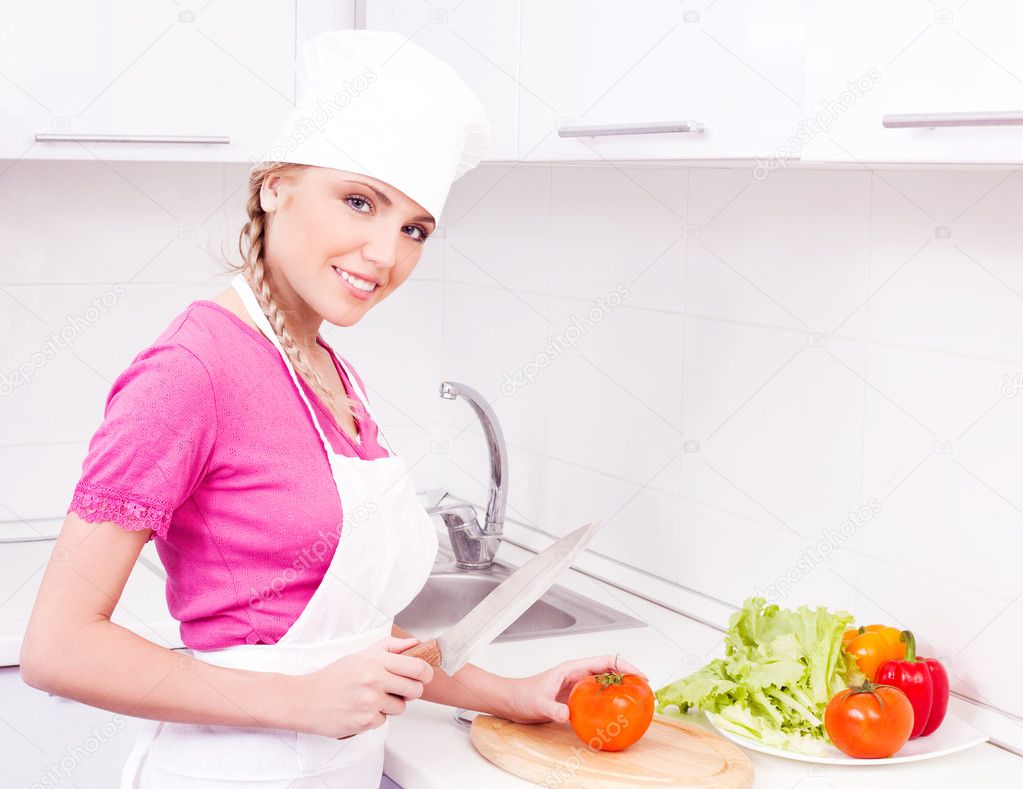 Woman cooking — Stock Photo © Photolin #18008869