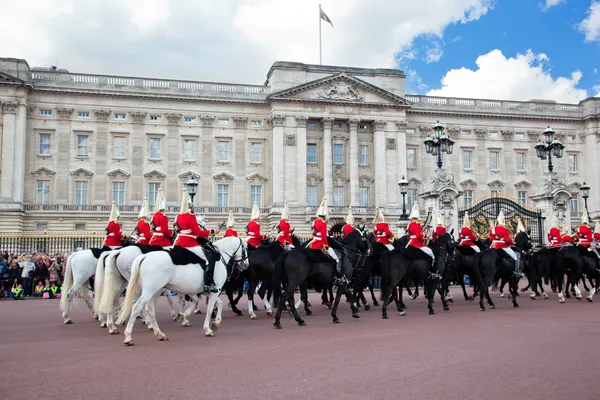 LONDON - MAY 17: British Royal guards riding on horse and perform the ...