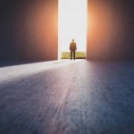 A man walking through a narrow pathway Stock Photo by ©kevron2002 30835835