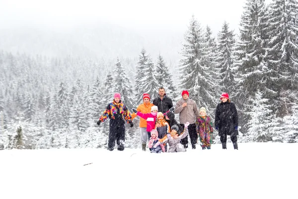 Family having fun in the snow Stock Photo by ©muhammed 20566679