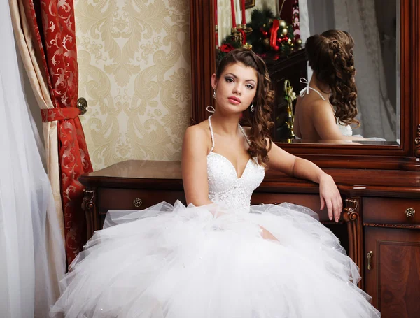 Happy bride jump on bed. Stock Photo by ©juice_team 29704015