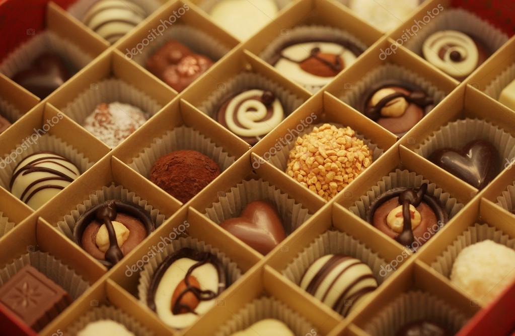 Chocolate candies in a box — Stock Photo © juice_team #45872627